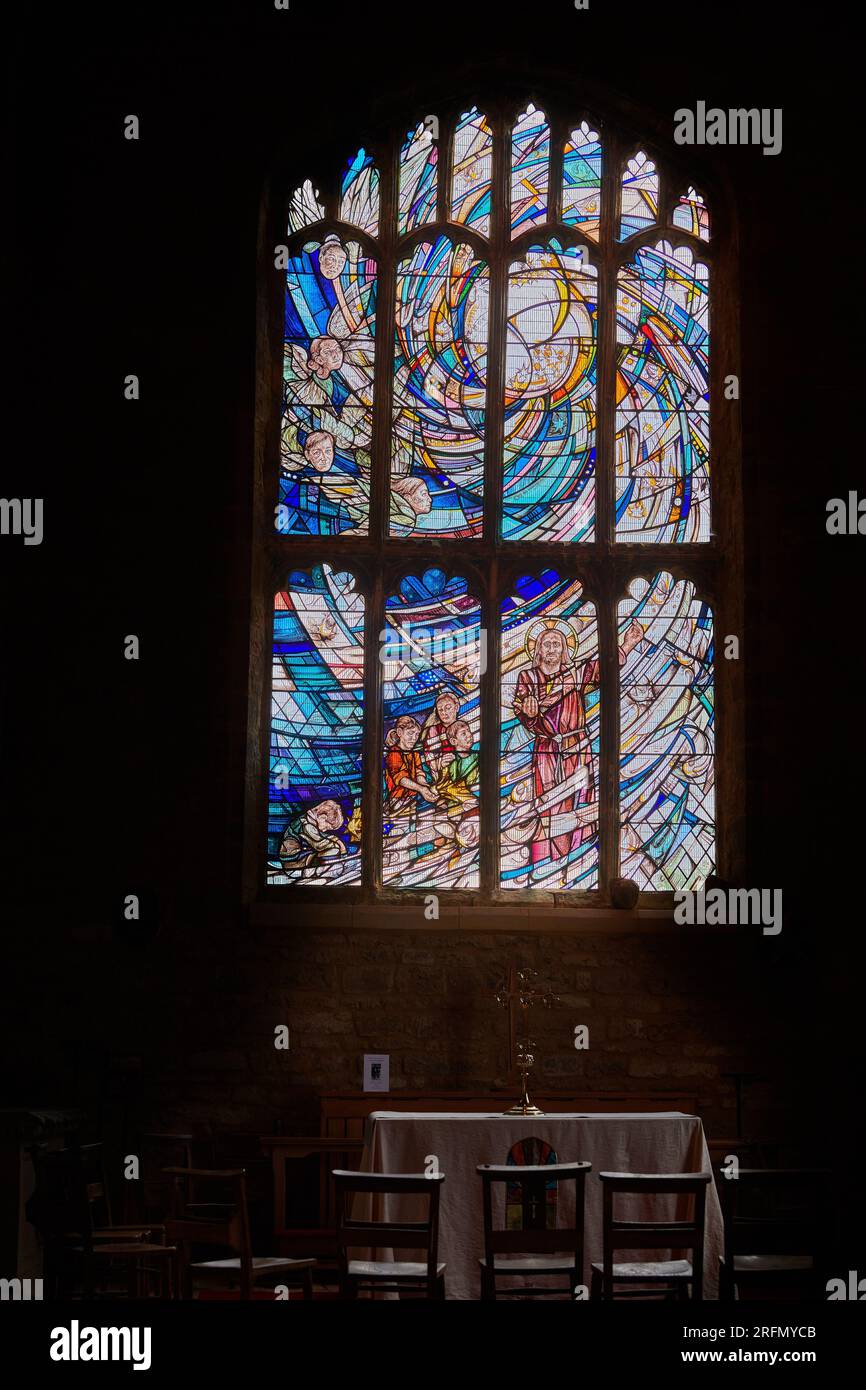 Modern stained glass window in a side chapel Holy Trinity christian ...