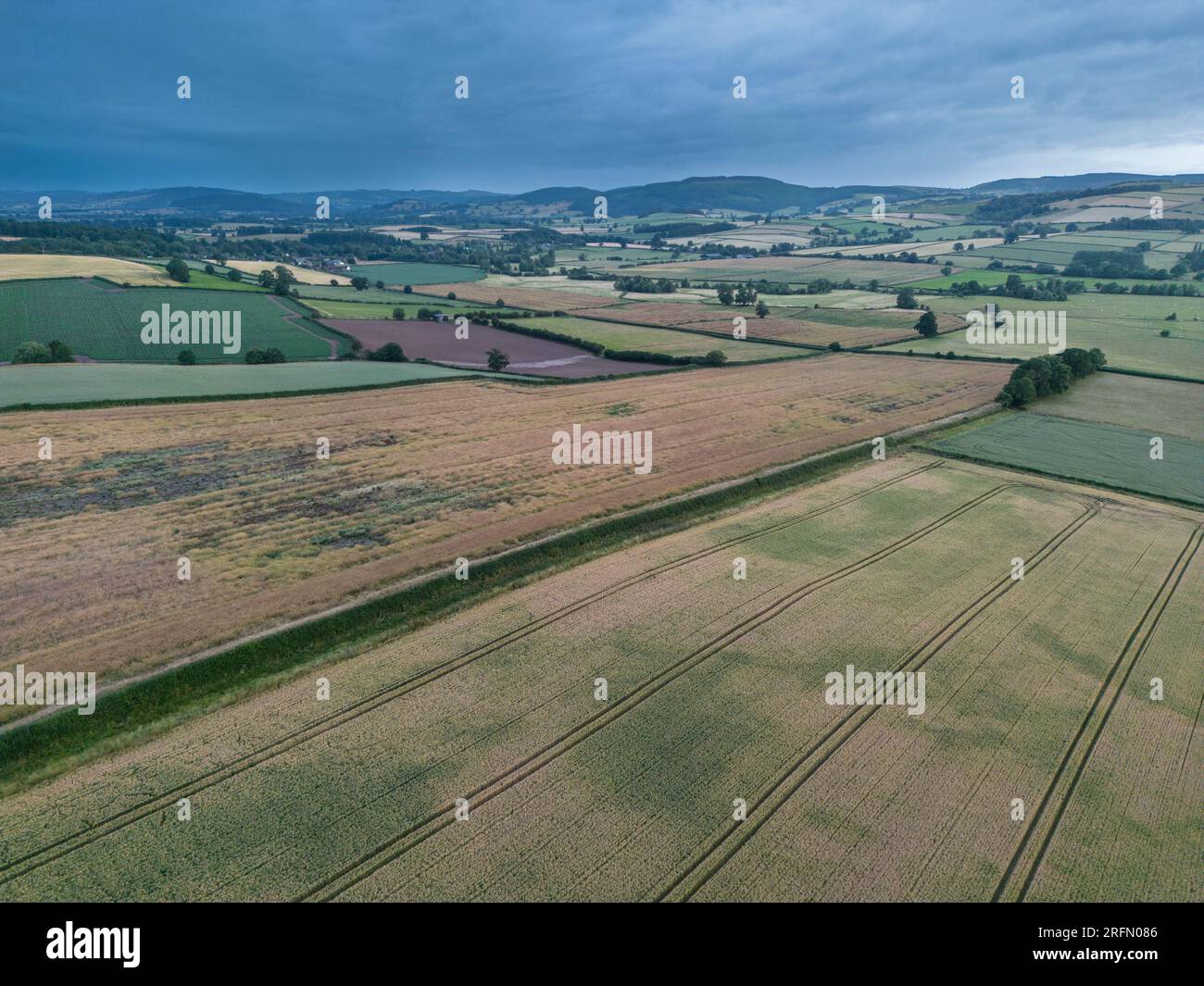 Aerial images of British farmland showing field boundaries and vehicle ...
