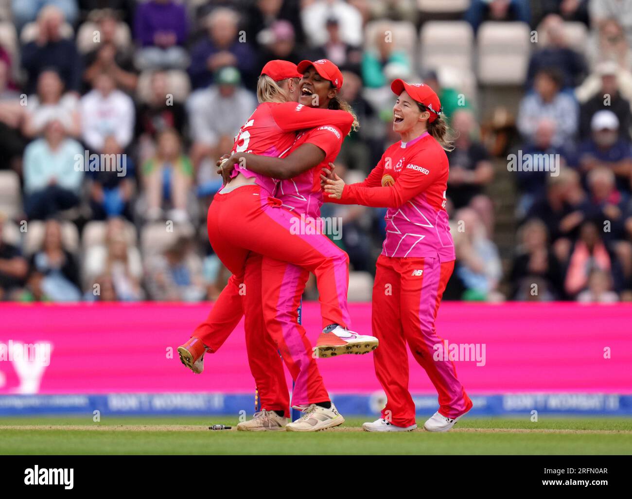 Welsh Fire's Hayley Matthews (centre) is congratulated by Alex ...