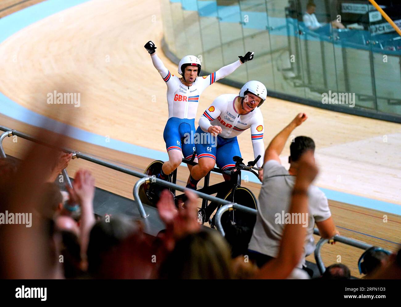 Great Britain's Neil Fachie and pilot Matt Rotherham celebrate winning ...