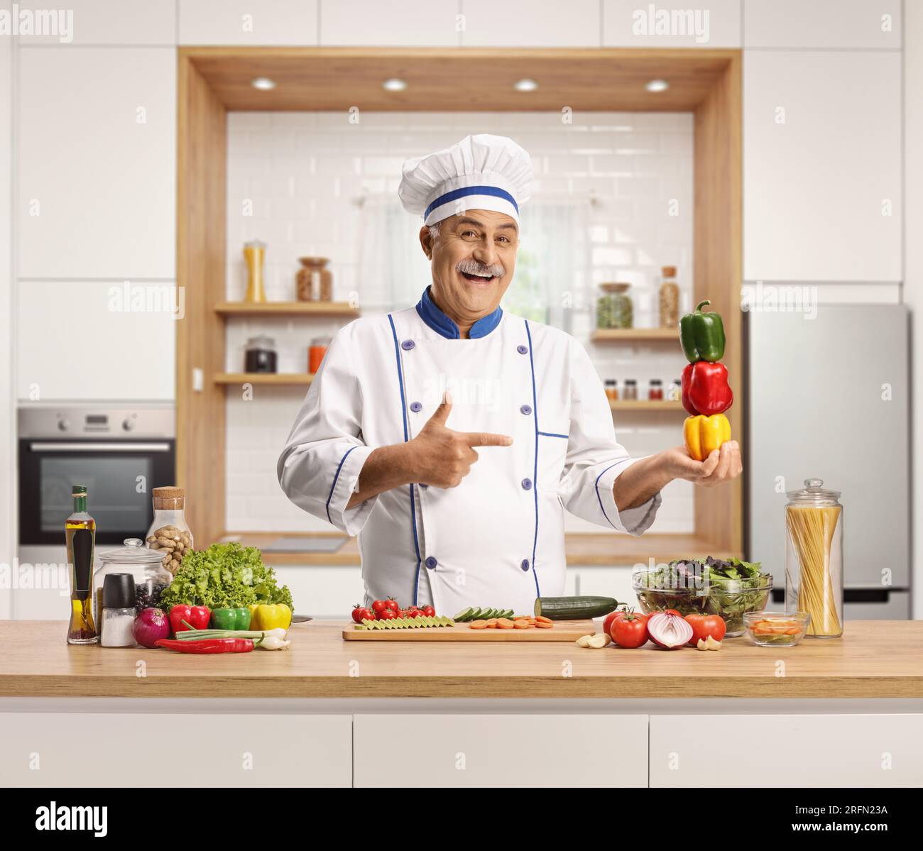 Man pointing kitchen apron hi-res stock photography and images - Alamy