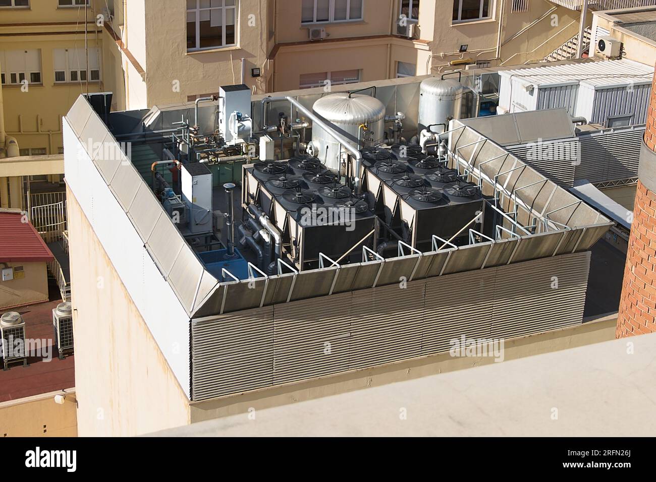 Industrial air conditioning and ventilation systems on the roof of a ...