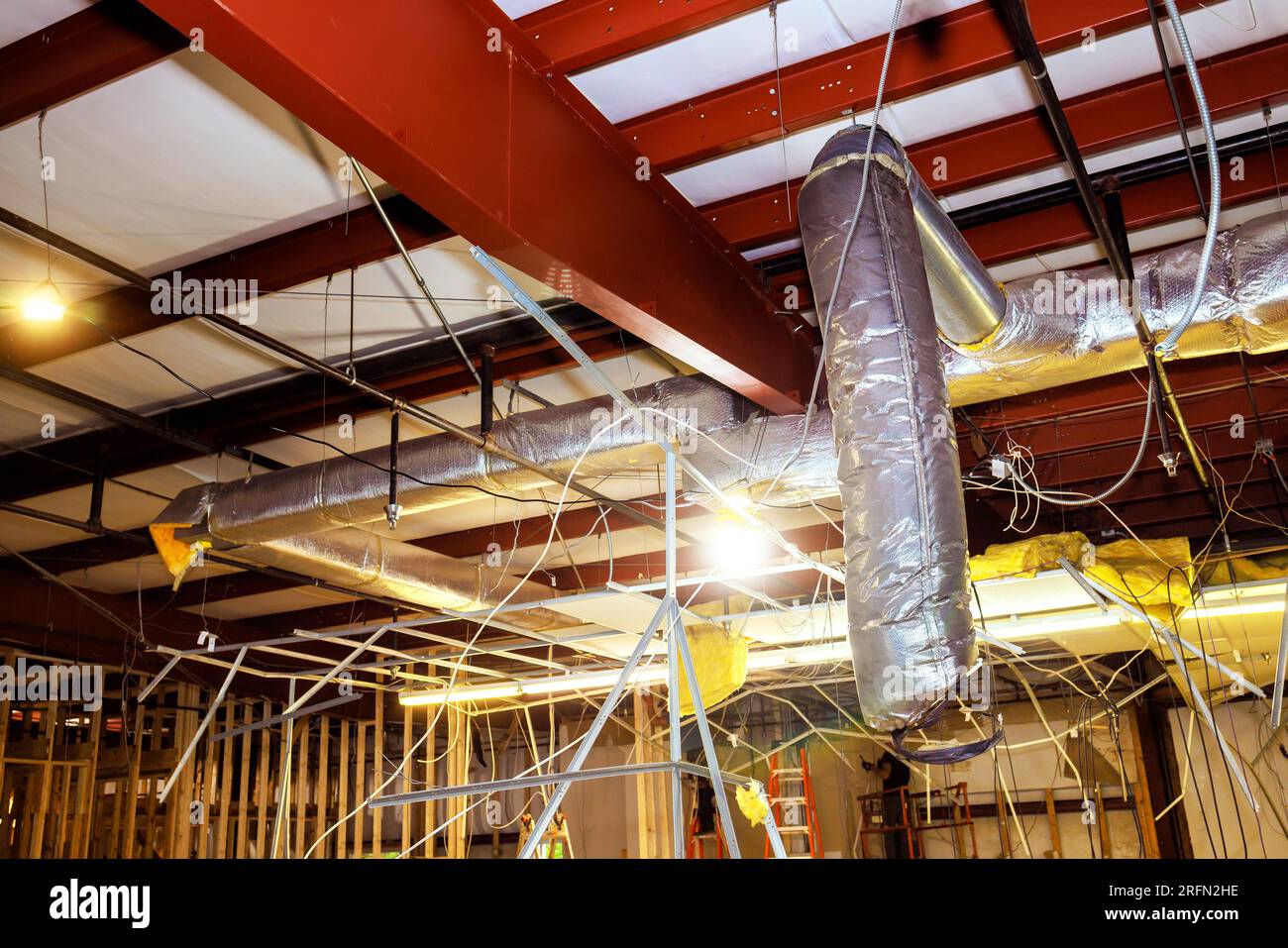 Ceiling works are carried out within construction complex during reconstruction of interior ...