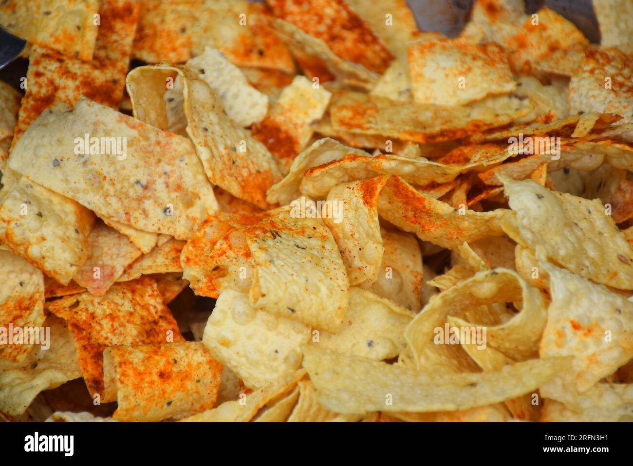 Fried and Spicy Tasty yellow papad, very crispy Stock Photo - Alamy