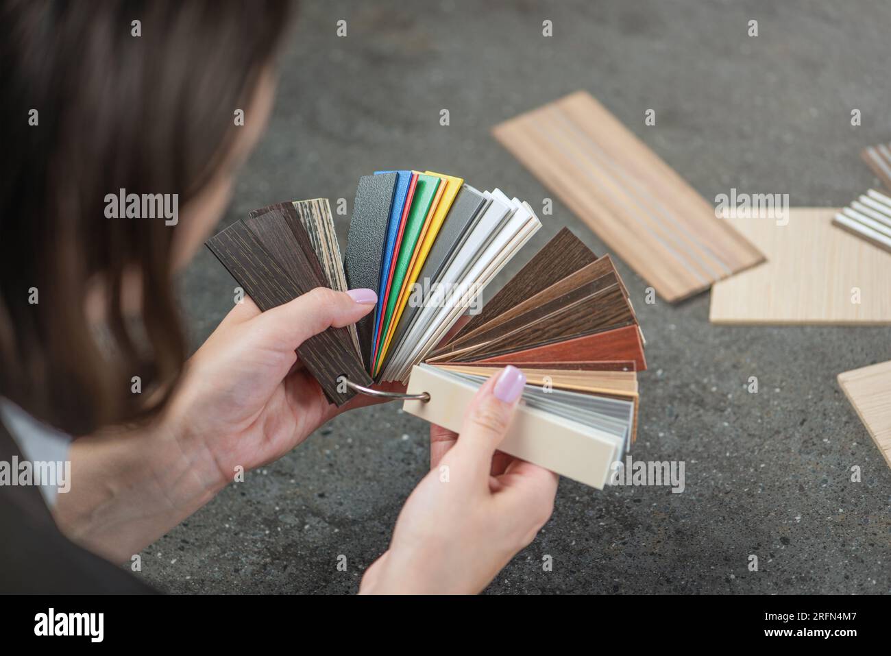 The designer chooses samples of pvc edging for the production of ...