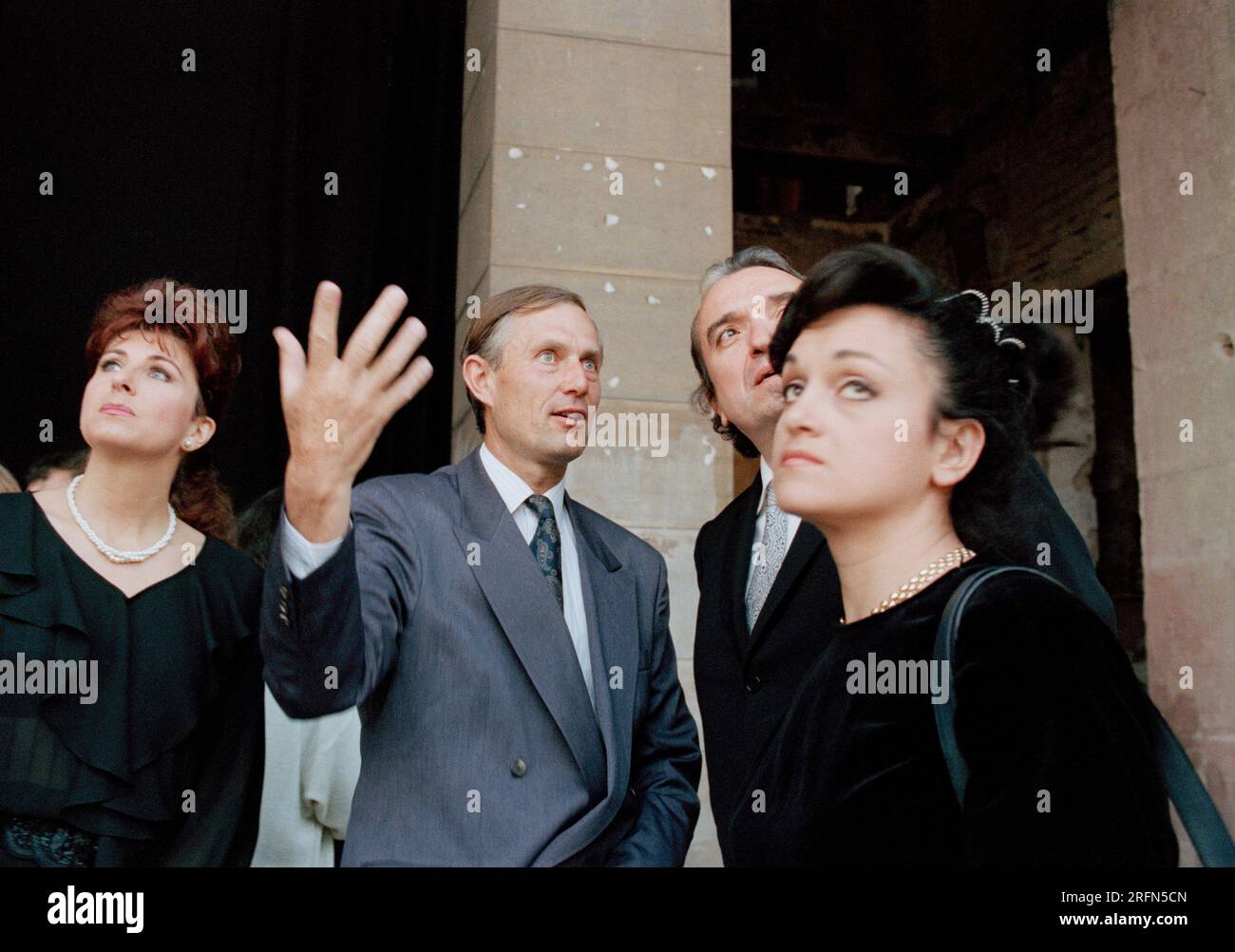 Lt. Gen. Sir Michael Rose, center, poses with opera singers in front of ...