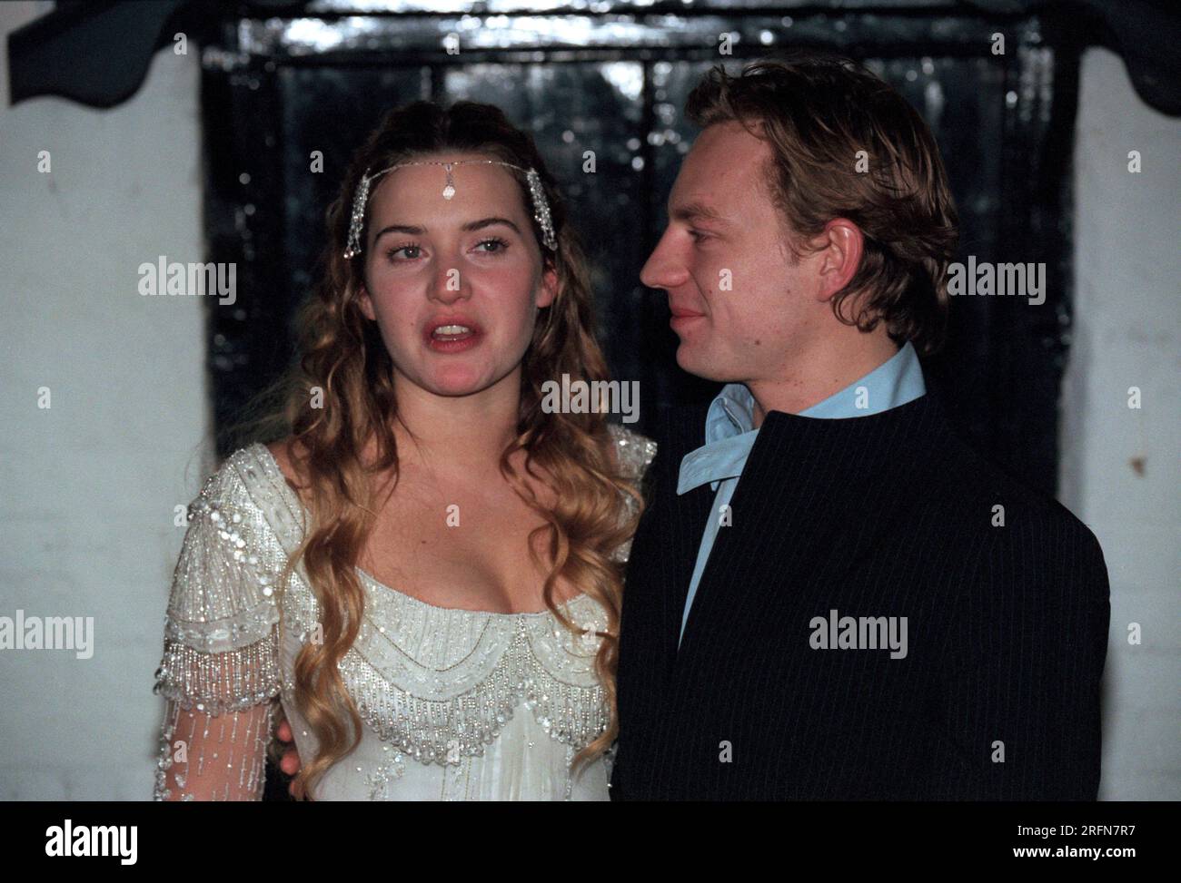 British actress Kate Winslet and Jim Threapleton pose for photographs ...