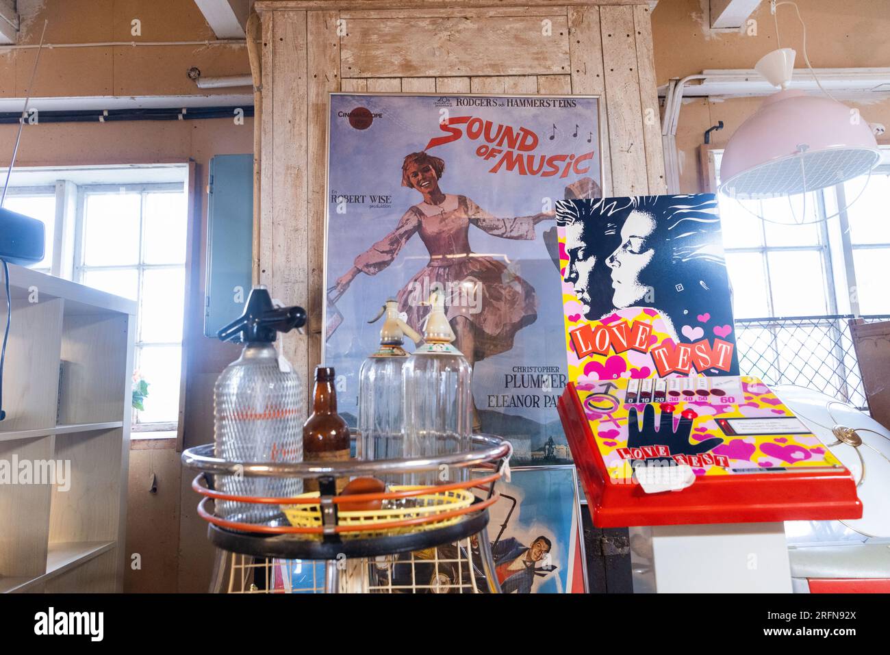 Signs and symbols, a flea market, Sound of Music movie poster Stock ...