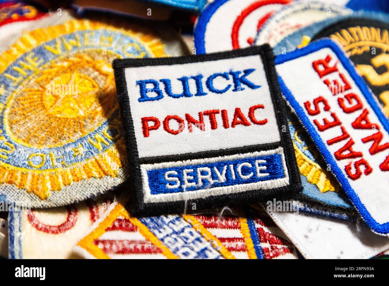 Signs and symbols, a flea market, Buick Pontiac service emblem Stock ...