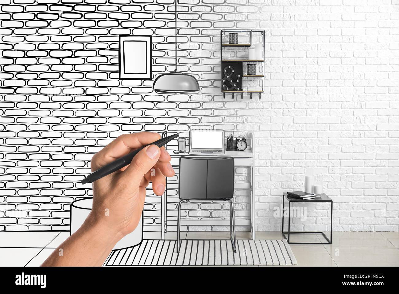 Designer drawing new interior of modern office Stock Photo - Alamy