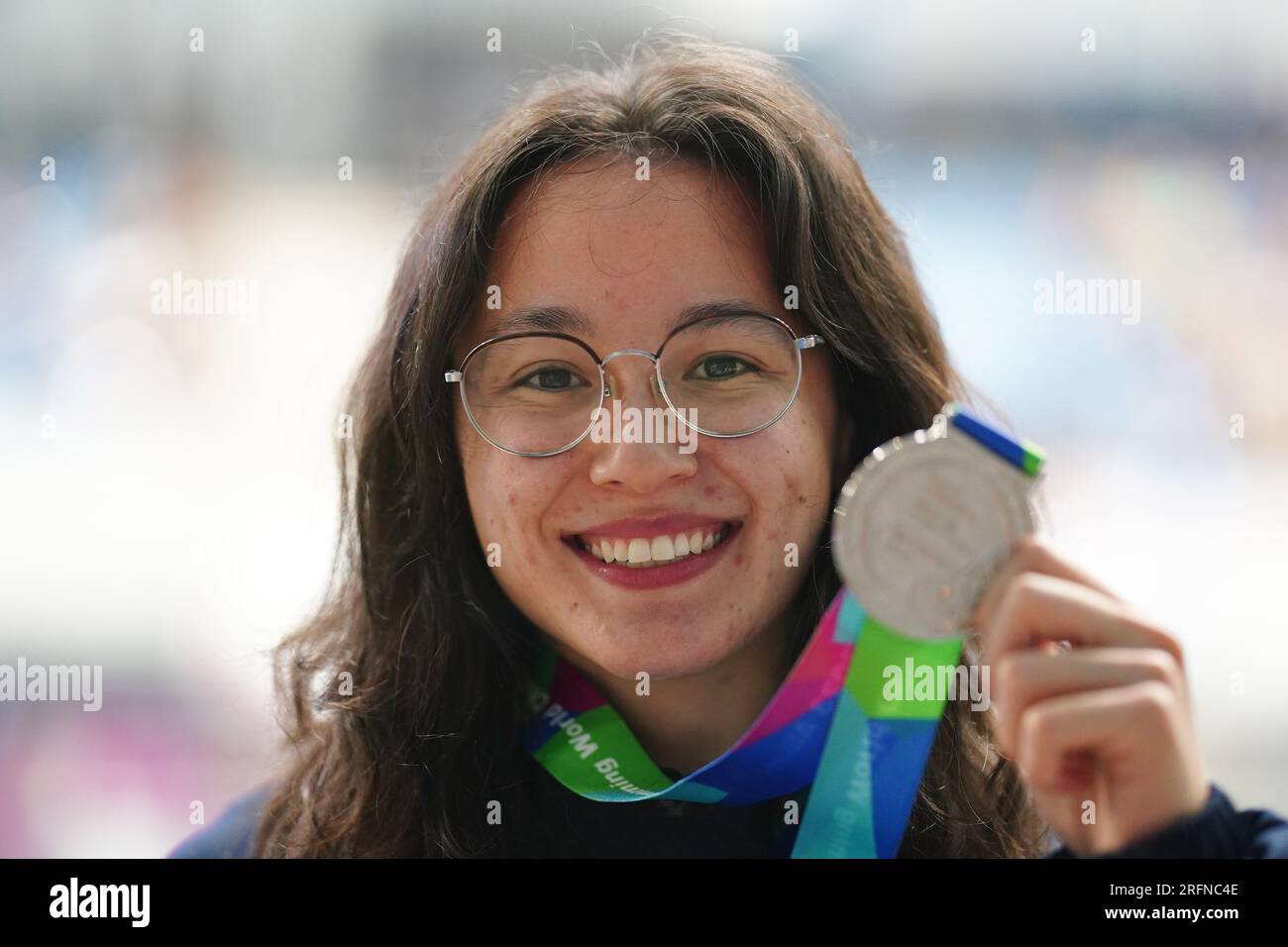 Great Britain's Alice Tai celebrates with her silver medal after coming ...