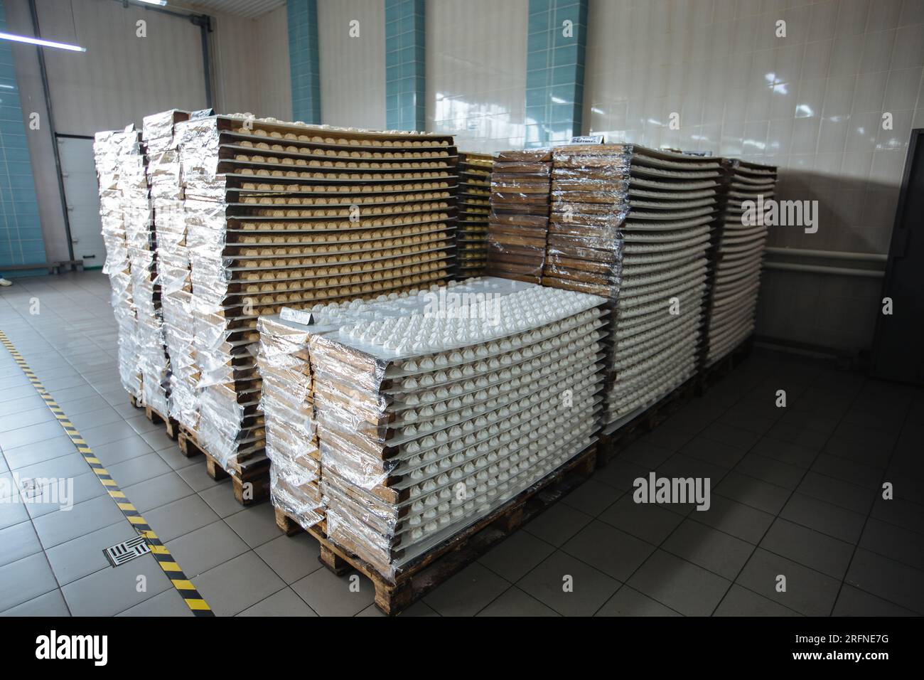 Semi-finished zephyrs drying and cooling on pallets in confectionery ...
