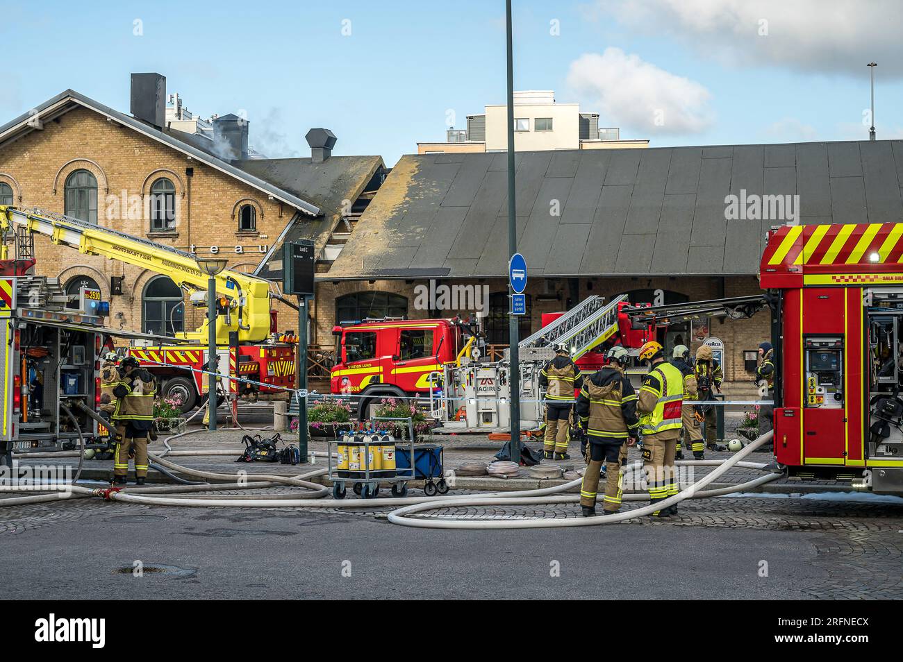 Firefighter ladder truck station hi-res stock photography and images ...