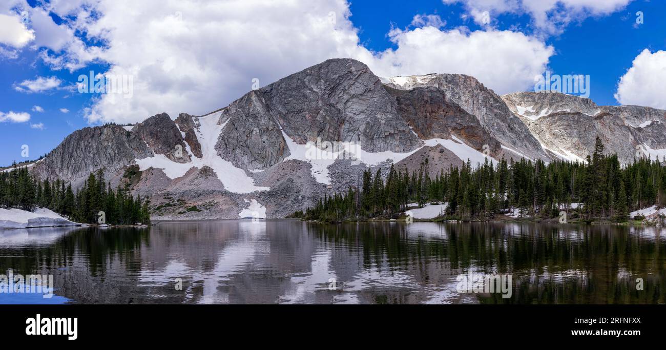 The Snowy Range mountains reflect off Lake Marie Stock Photo - Alamy