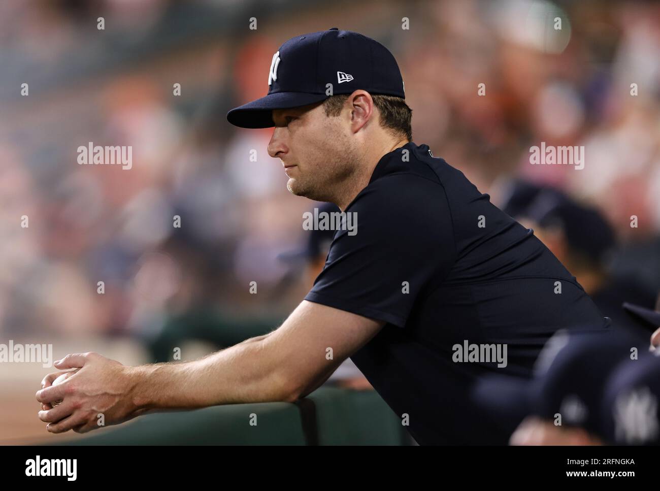 New York Yankees pitcher Gerrit Cole (45) watches on from the dugout on ...