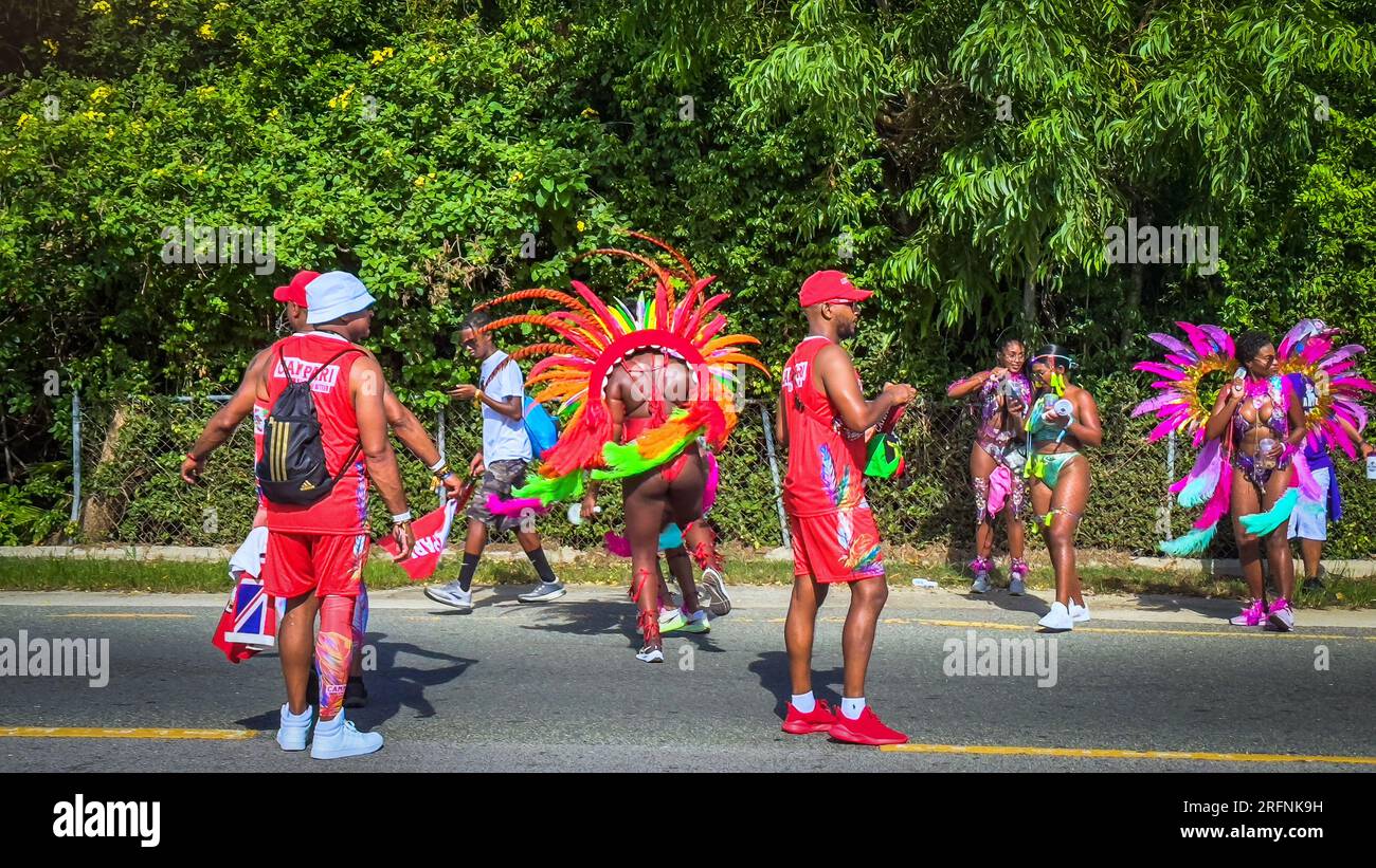 Grand Cayman, Cayman Islands, July 1st, 2023, carnival goers parading ...
