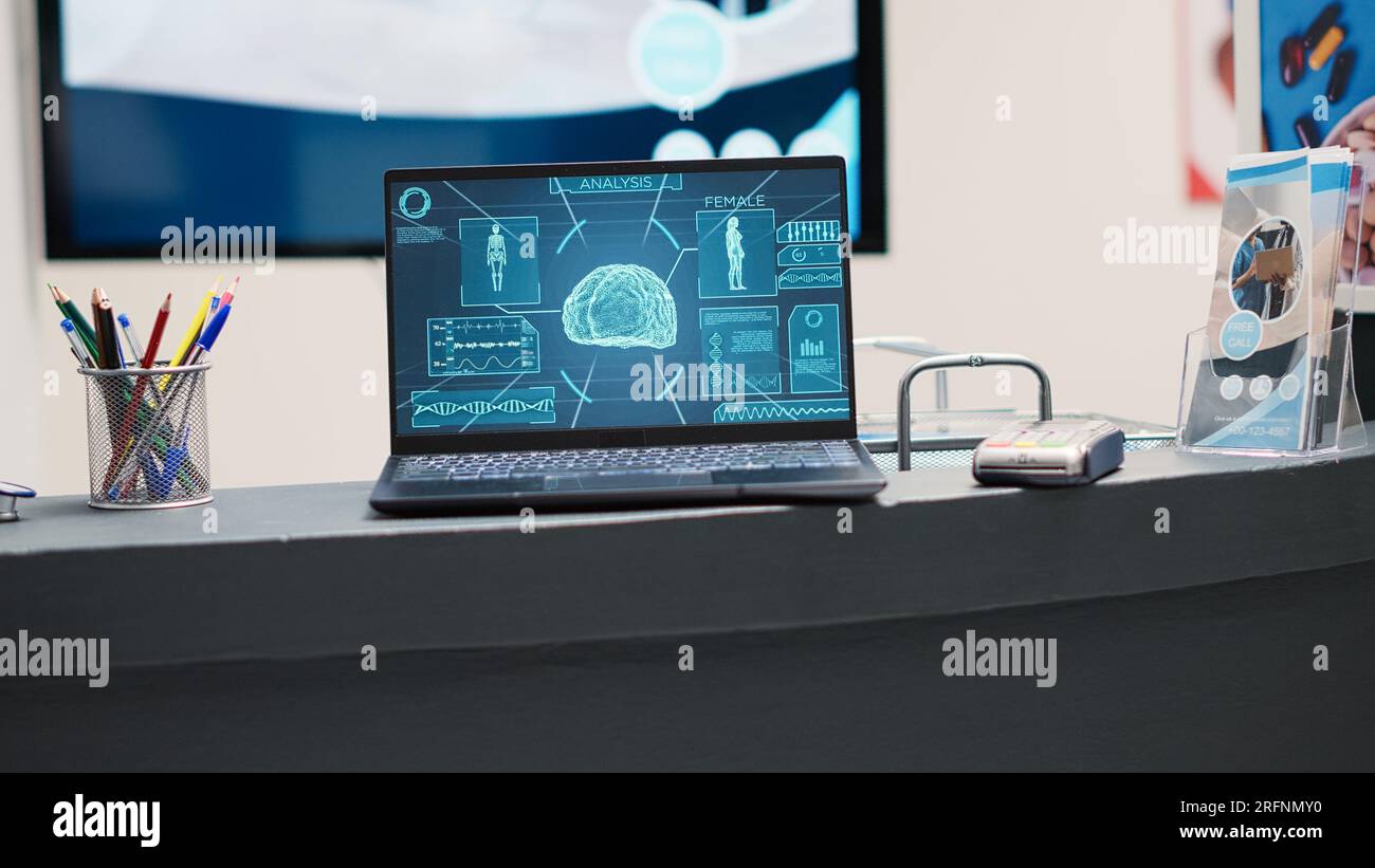 Laptop with brain x ray scan on counter, neuroscience radiography ...