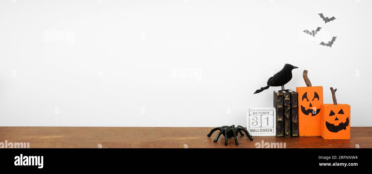 Halloween shelf display with rustic wood jack o lantern decor, spider ...