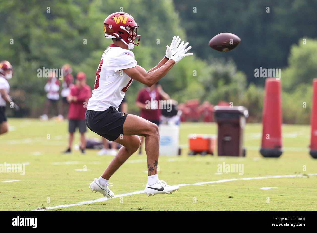 Washington Commanders Wide Receiver Jalen Sample (18) makes the catch ...