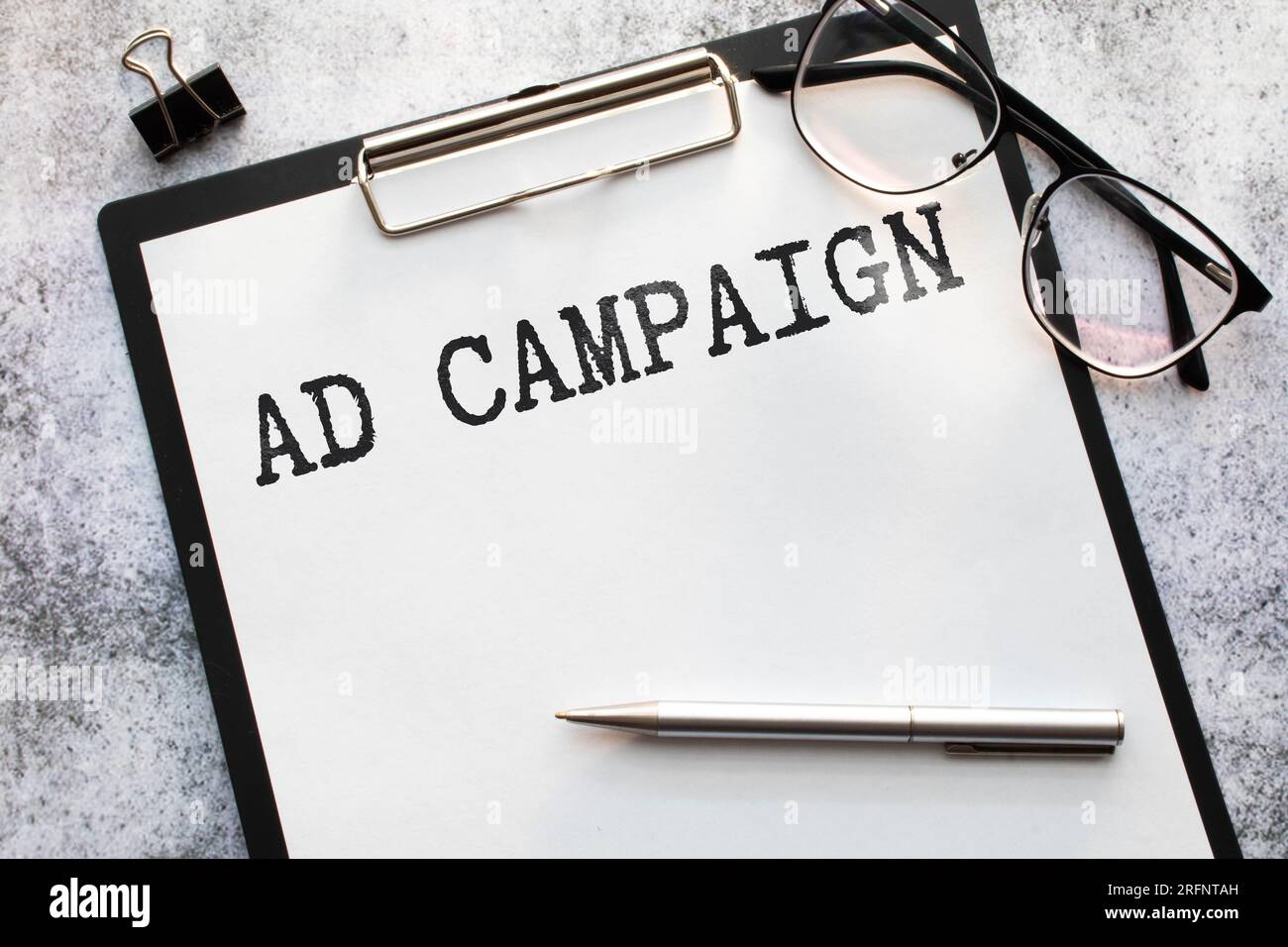 Notebook with Tools and Notes About ad campaign Stock Photo - Alamy