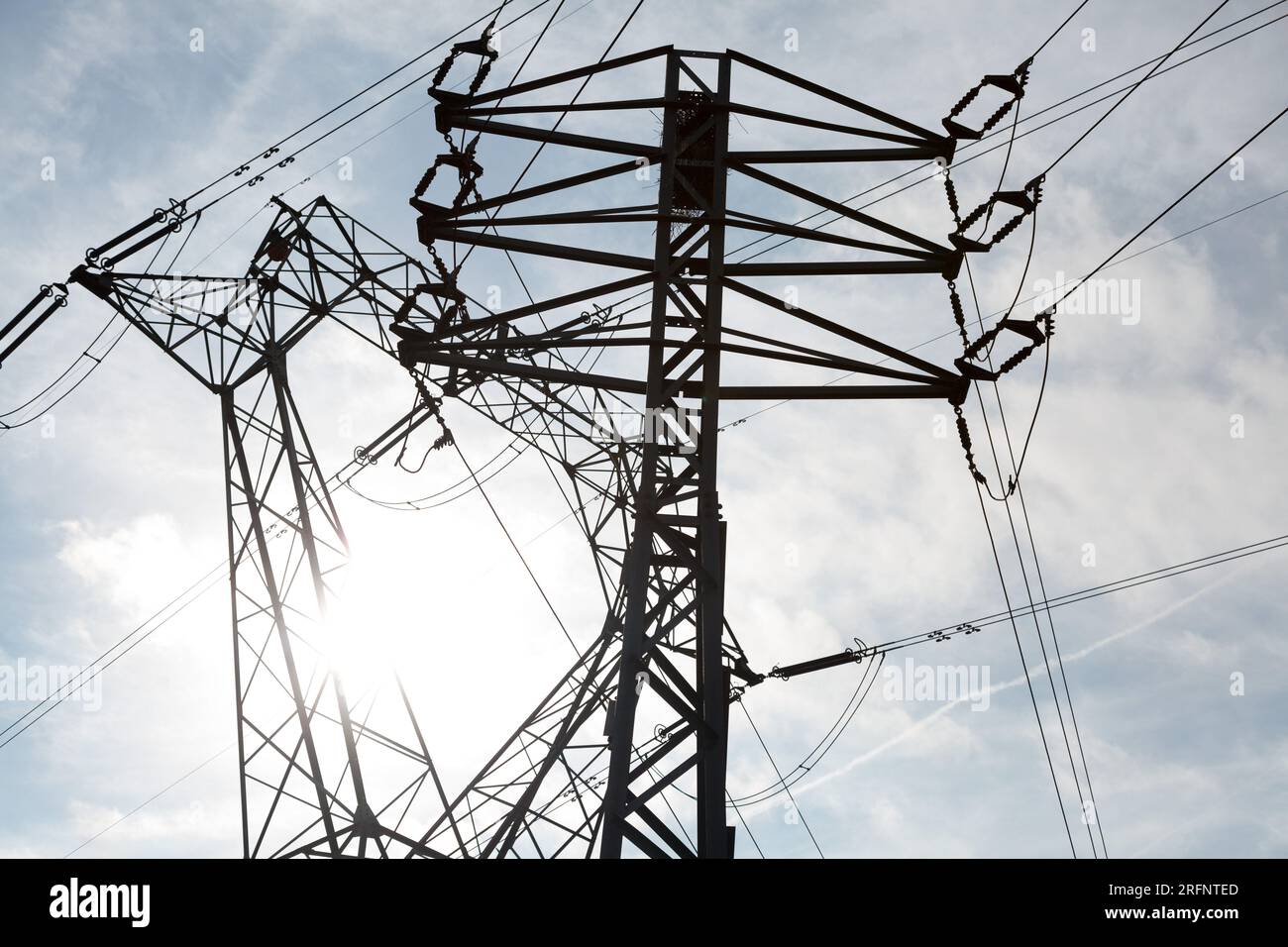 Electric towers for transporting electrical energy Stock Photo - Alamy