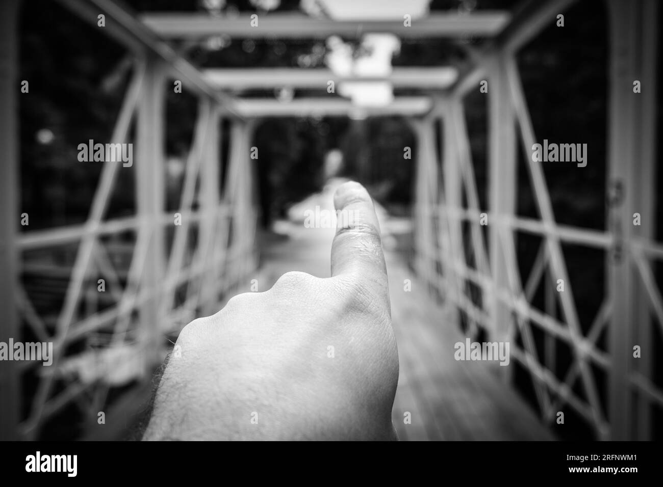 Finger pointing at wrist Black and White Stock Photos & Images - Alamy