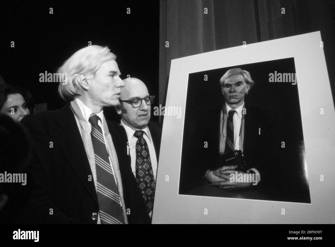 Pop artist Andy Warhol with a large format 20 x 24 Polaroid print ...