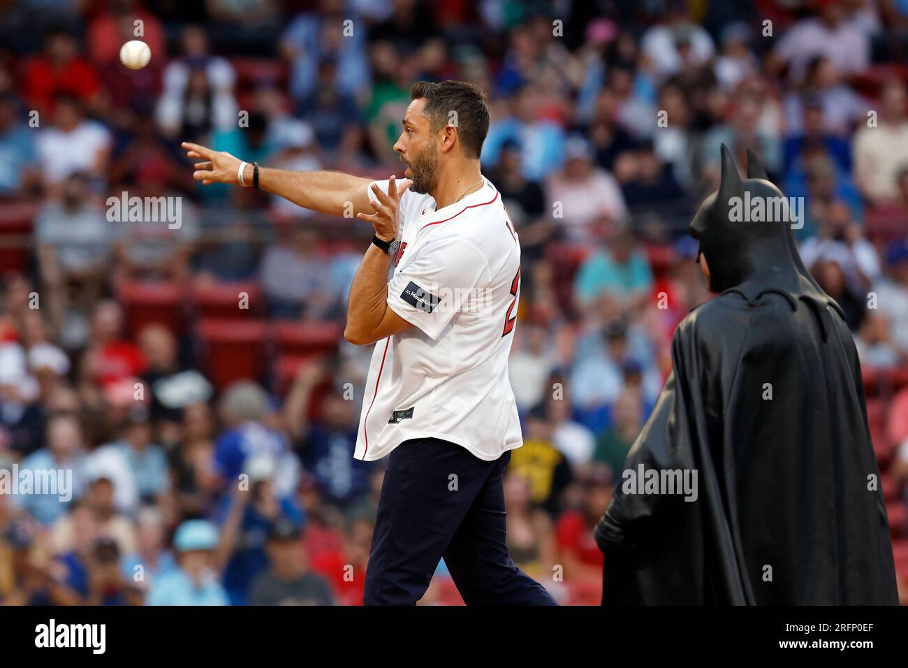 Zachary Levi throws the ceremonial first pitch before a baseball game ...