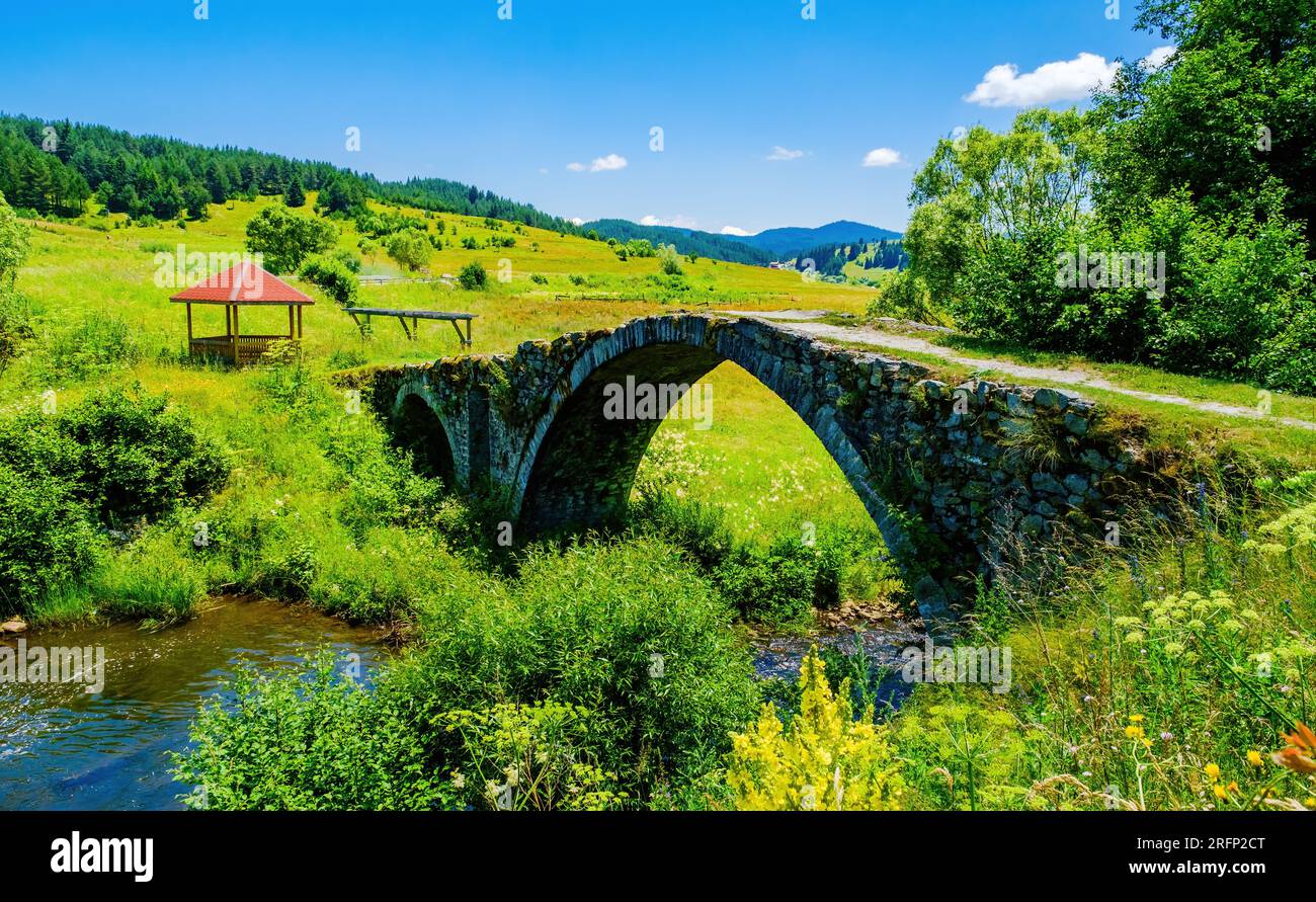 Ancient roman style build bridge from stones with arc Stock Photo - Alamy