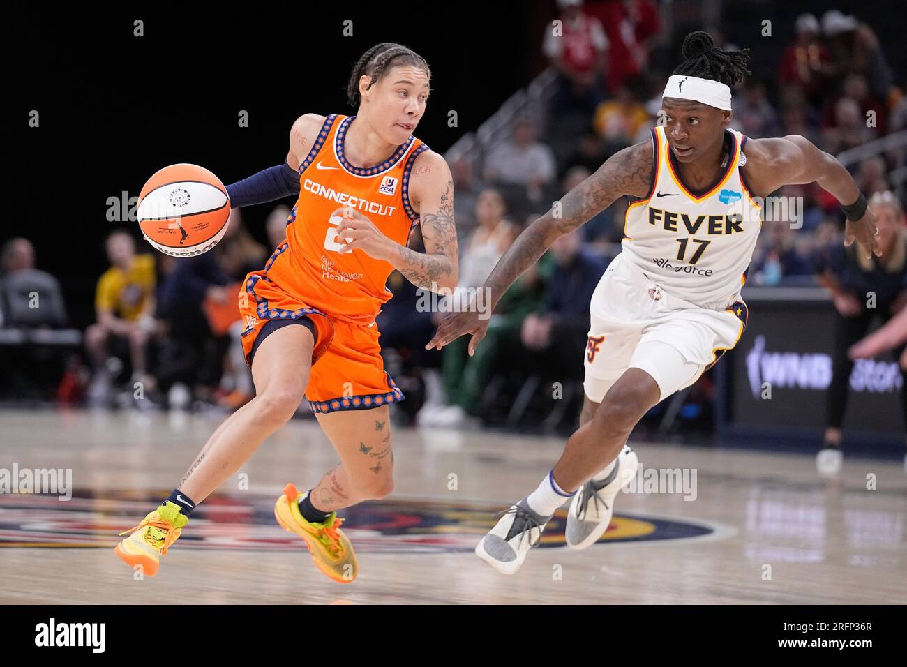 Connecticut Sun's Natisha Hiedeman (2) drives against Indiana Fever's ...