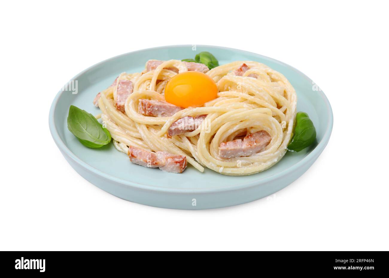 Plate Of Delicious Pasta Carbonara With Egg Yolk Isolated On White