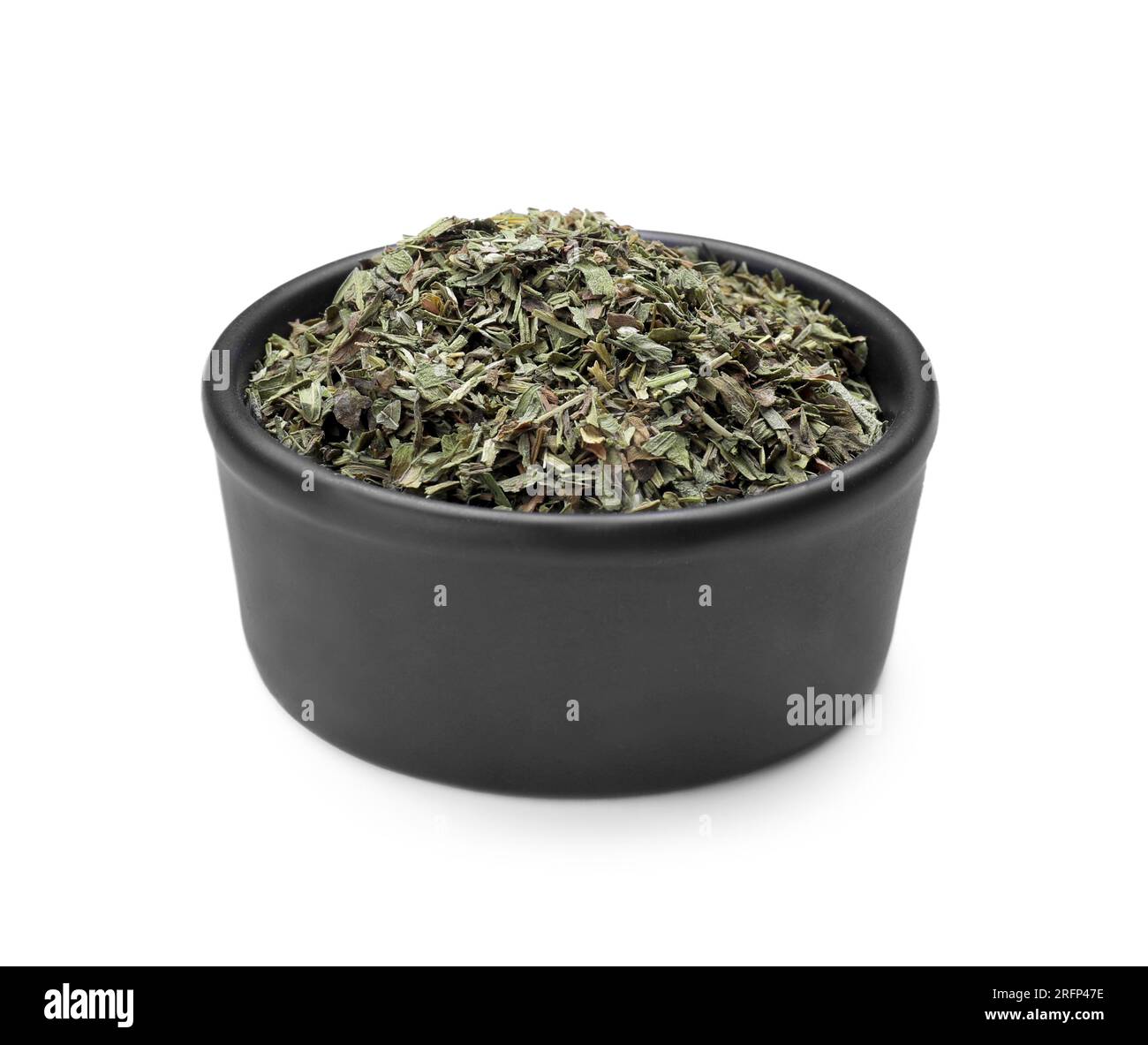Bowl of dry tarragon isolated on white Stock Photo - Alamy