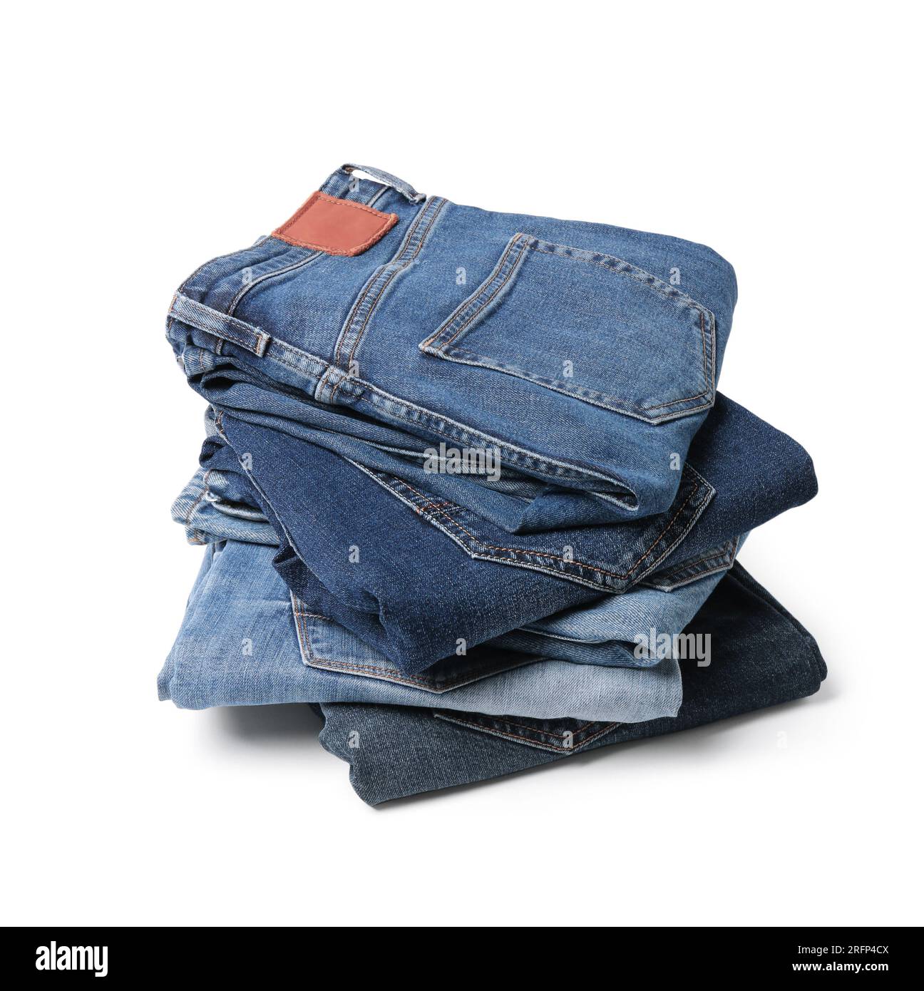 Stack of different folded jeans isolated on white Stock Photo - Alamy