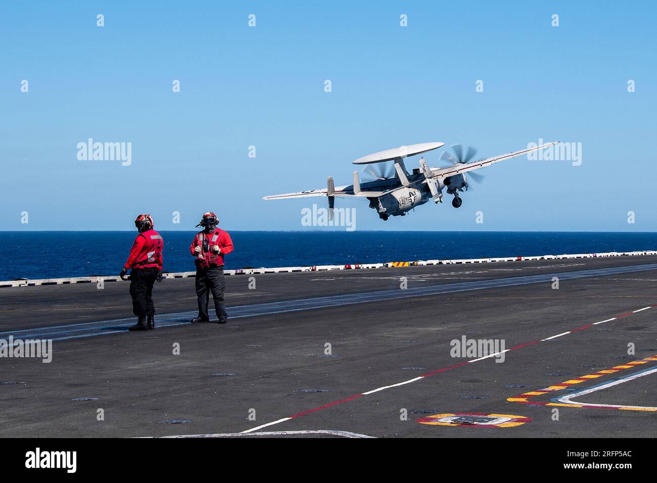 INDIAN OCEAN (Aug. 4, 2023) An E-2D Hawkeye, attached to the Tiger ...