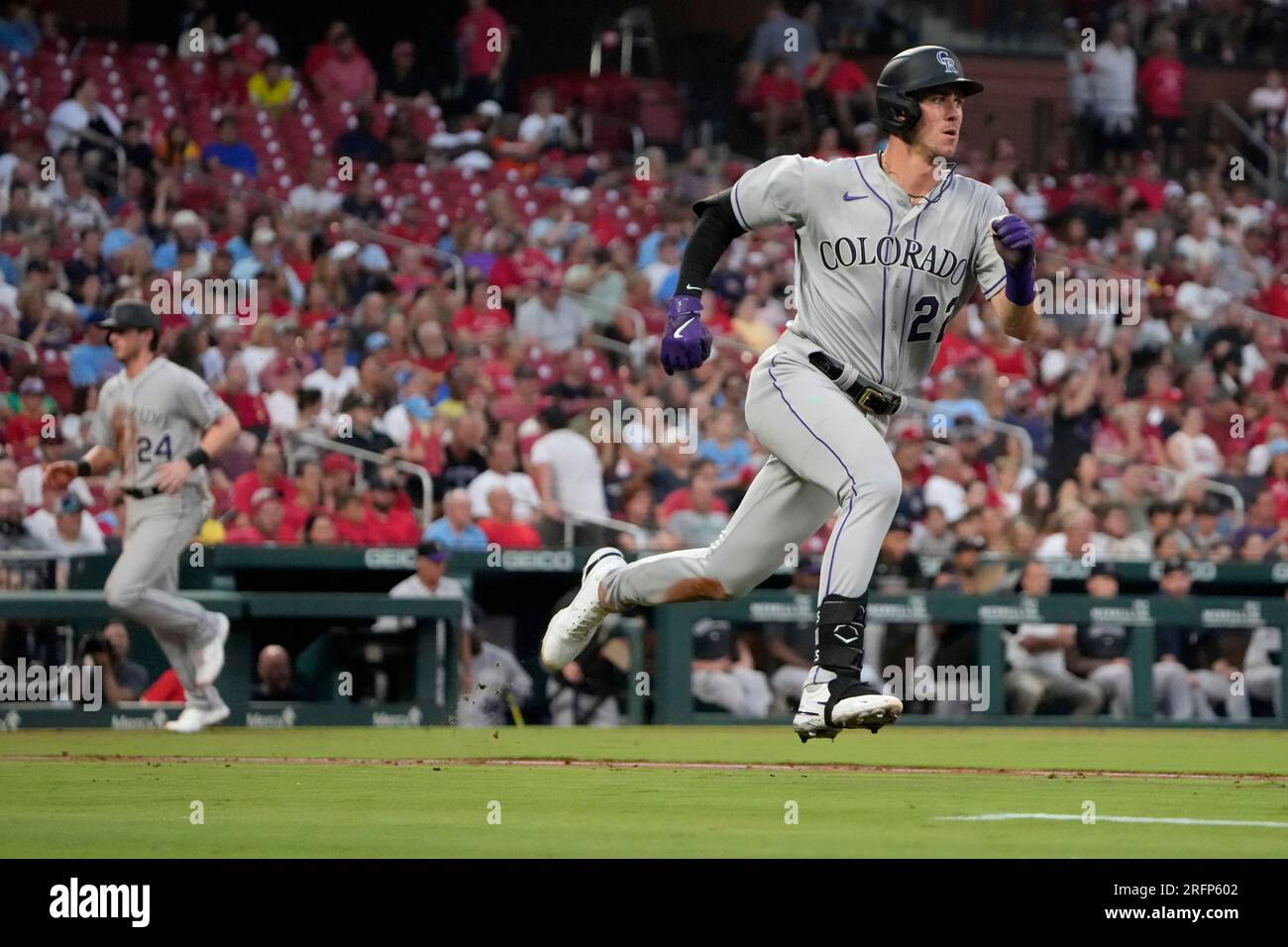 Colorado Rockies' Nolan Jones (22) heads to first on an RBI single as ...