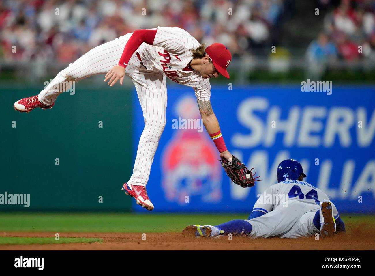 Kansas City Royals' Dairon Blanco, right, steals second under the tag from Philadelphia Phillies ...