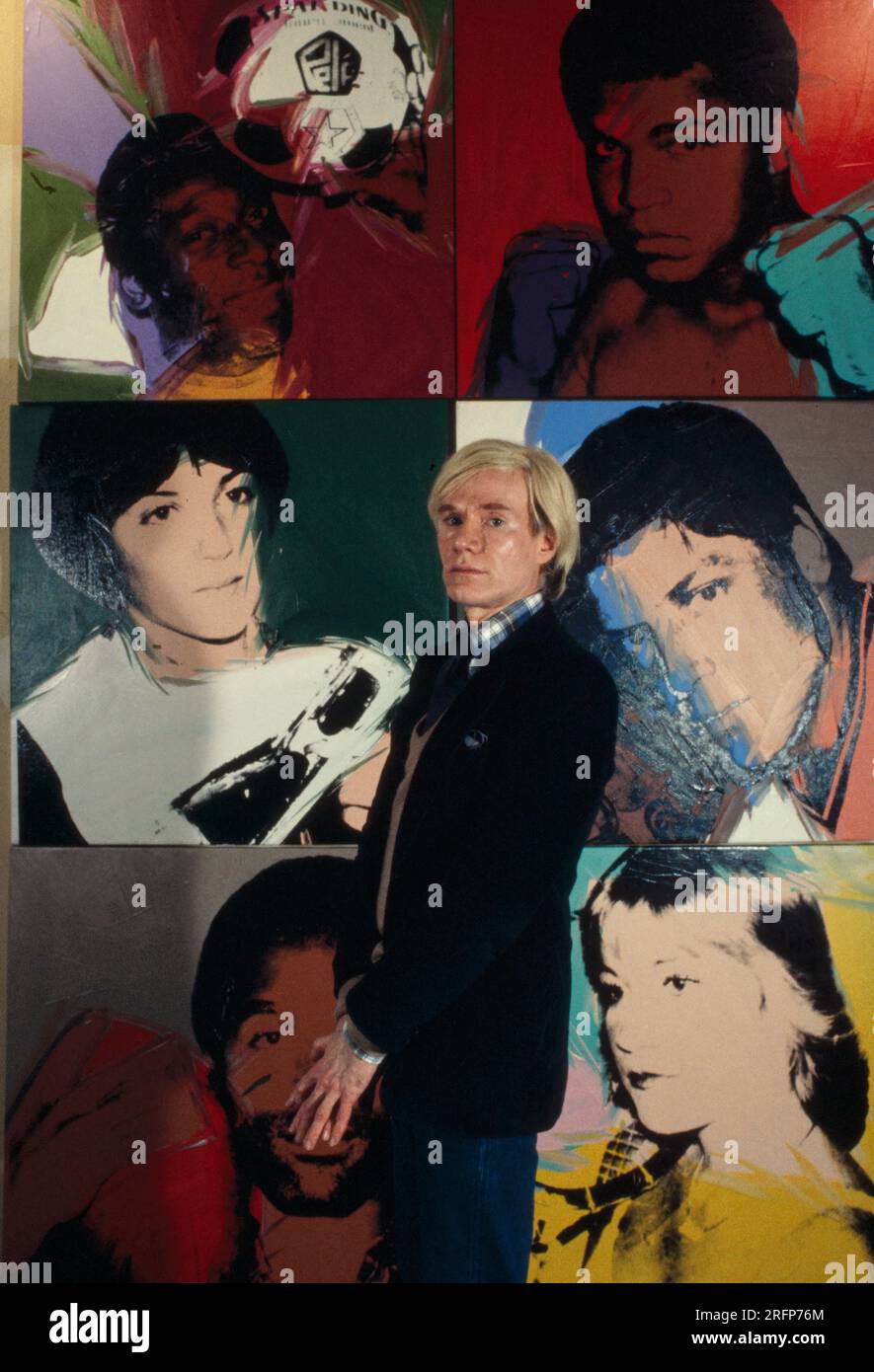 Andy Warhol in a NY gallery with his art portraits in 1975. Warhol was ...