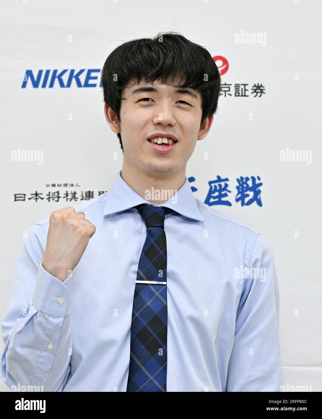 Sota Fujii, holder of seven of shogi's eight titles, poses after ...