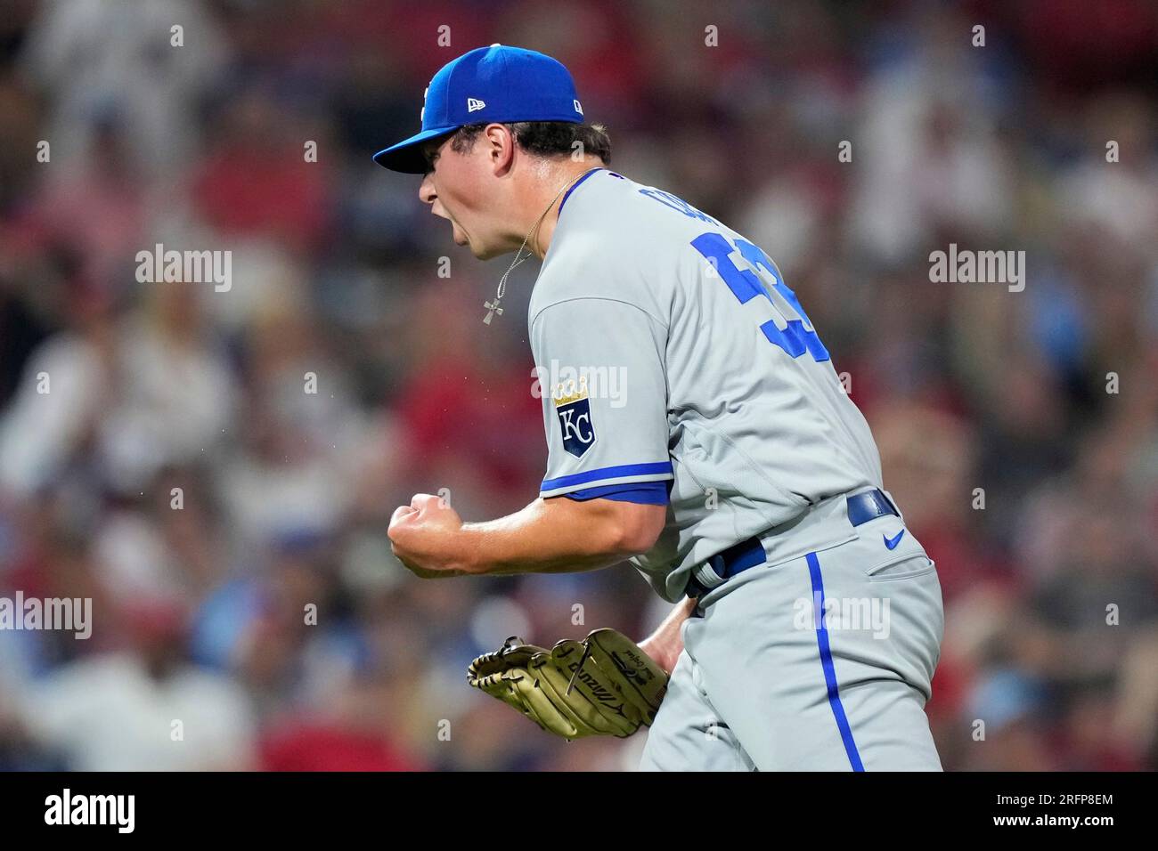 Kansas City Royals' Austin Cox reacts after the Royals won a baseball ...