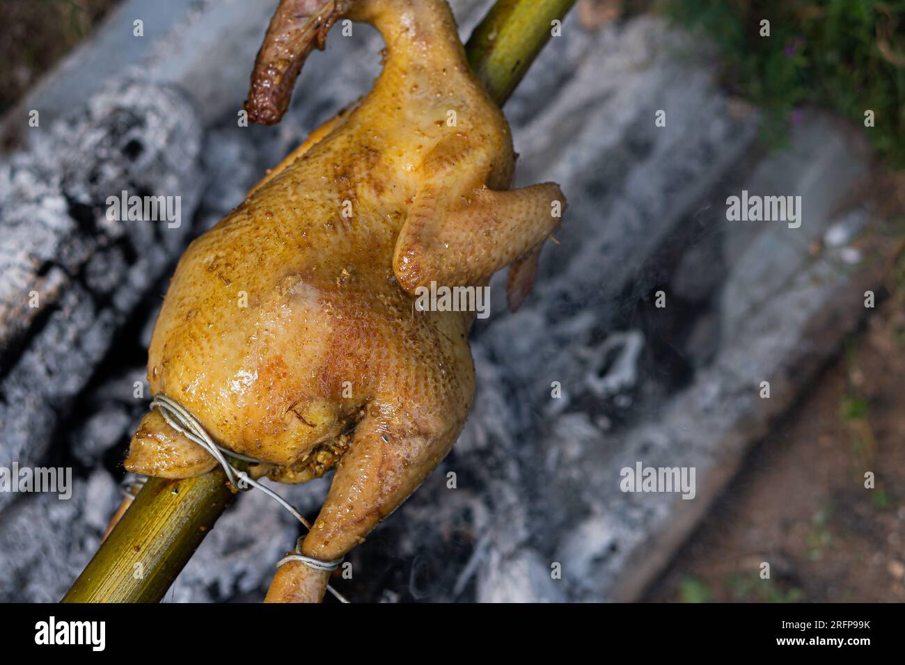 Spit roasted chicken hi-res stock photography and images - Alamy