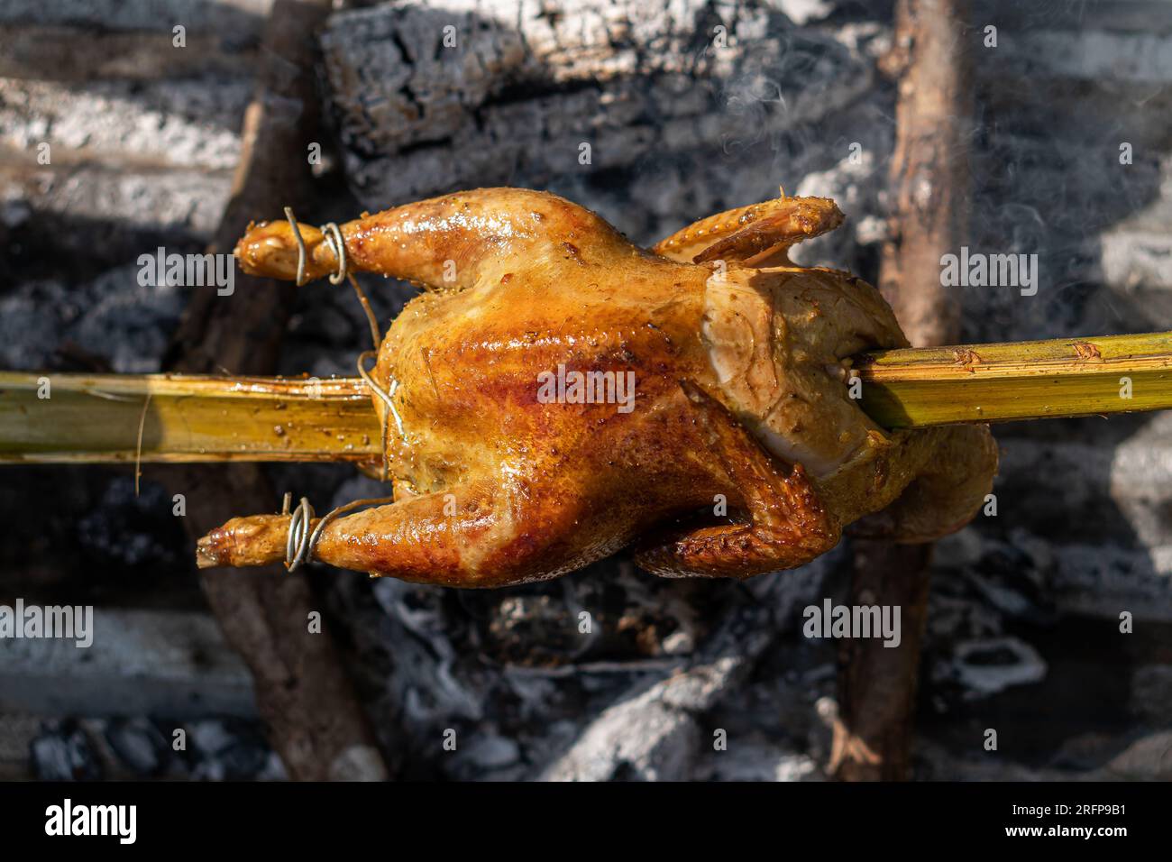 Spit roasted chicken hi-res stock photography and images - Alamy