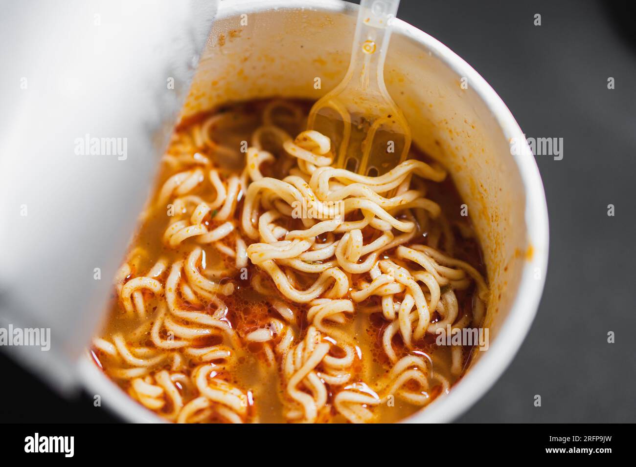 cup noodles hot and spicy instant food Stock Photo - Alamy