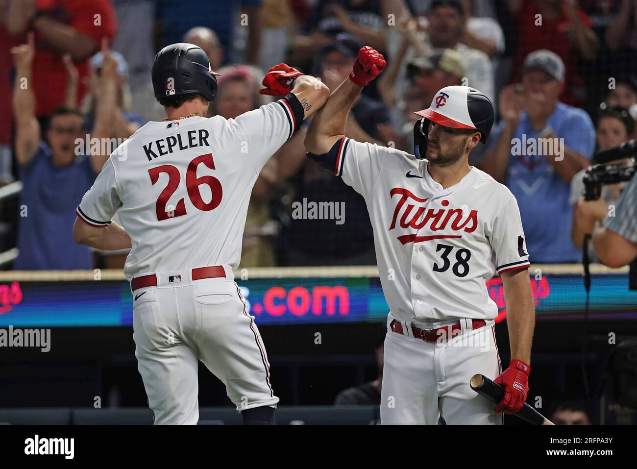 Minnesota Twins' Max Kepler (26) celebrates with Matt Wallner (38 ...