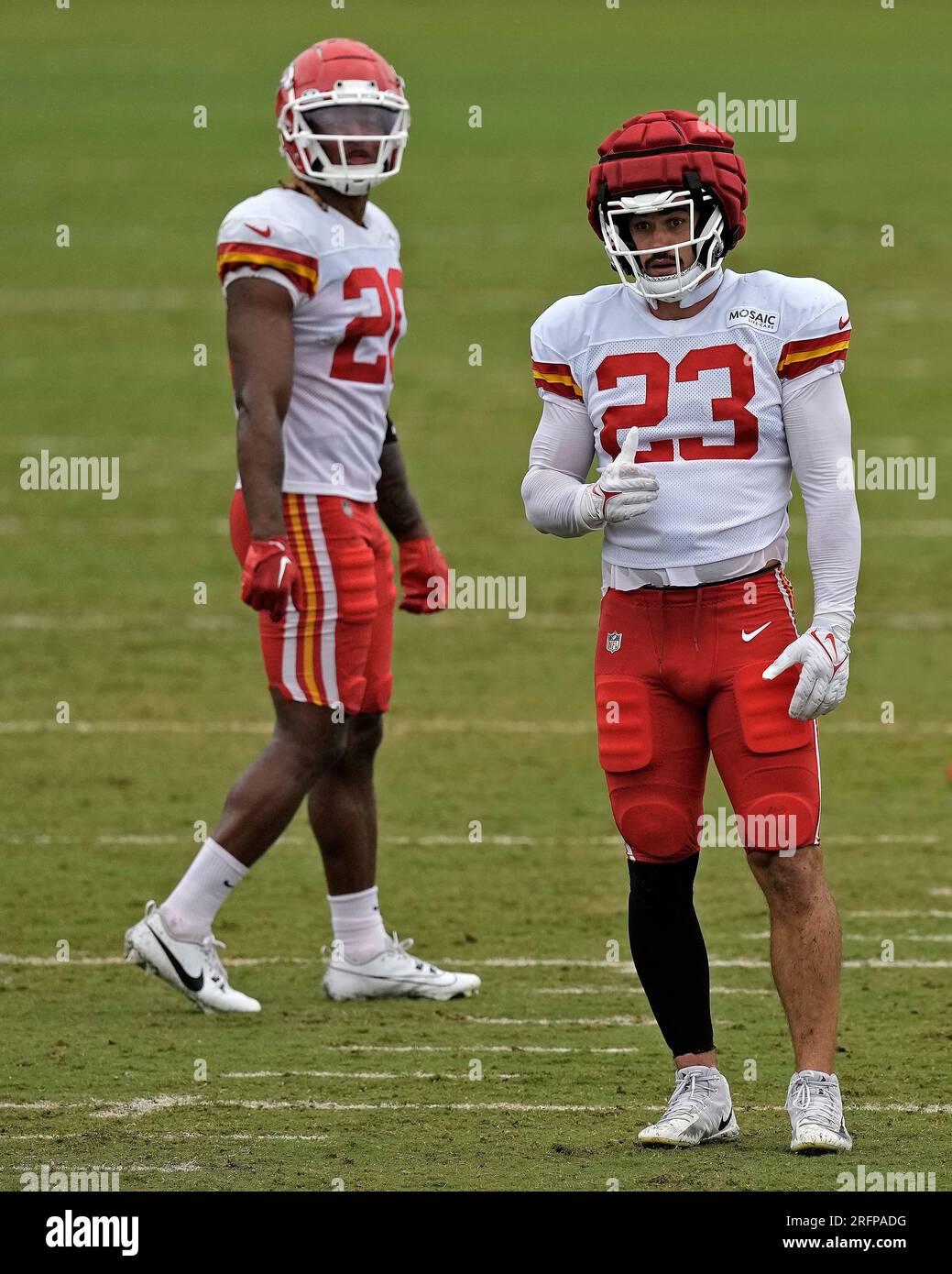 Kansas City Chiefs linebacker Drue Tranquill (23) and safety Justin ...