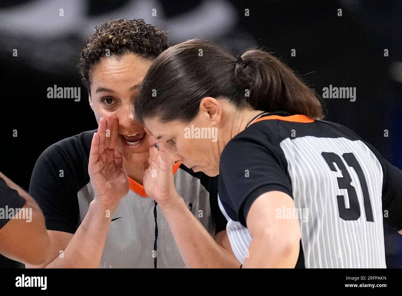 WNBA referee Amy Bonner (31) listens to Tiara Cruse during a time out ...