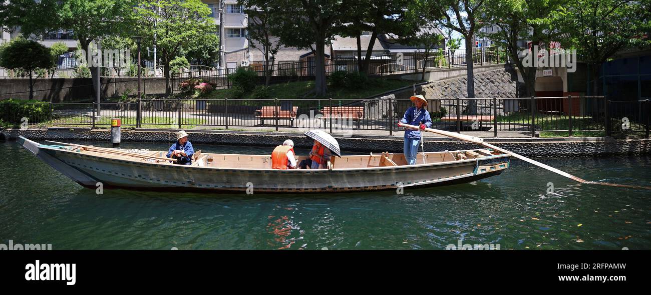 A picture shows Wasen, a traditional Japanese wooden boat propelled by ...