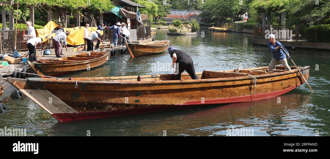 A picture shows Wasen, a traditional Japanese wooden boat propelled by ...