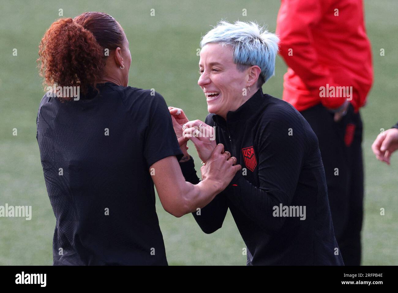 United States' Lynn Williams, left, and Megan Rapinoe laugh during a ...
