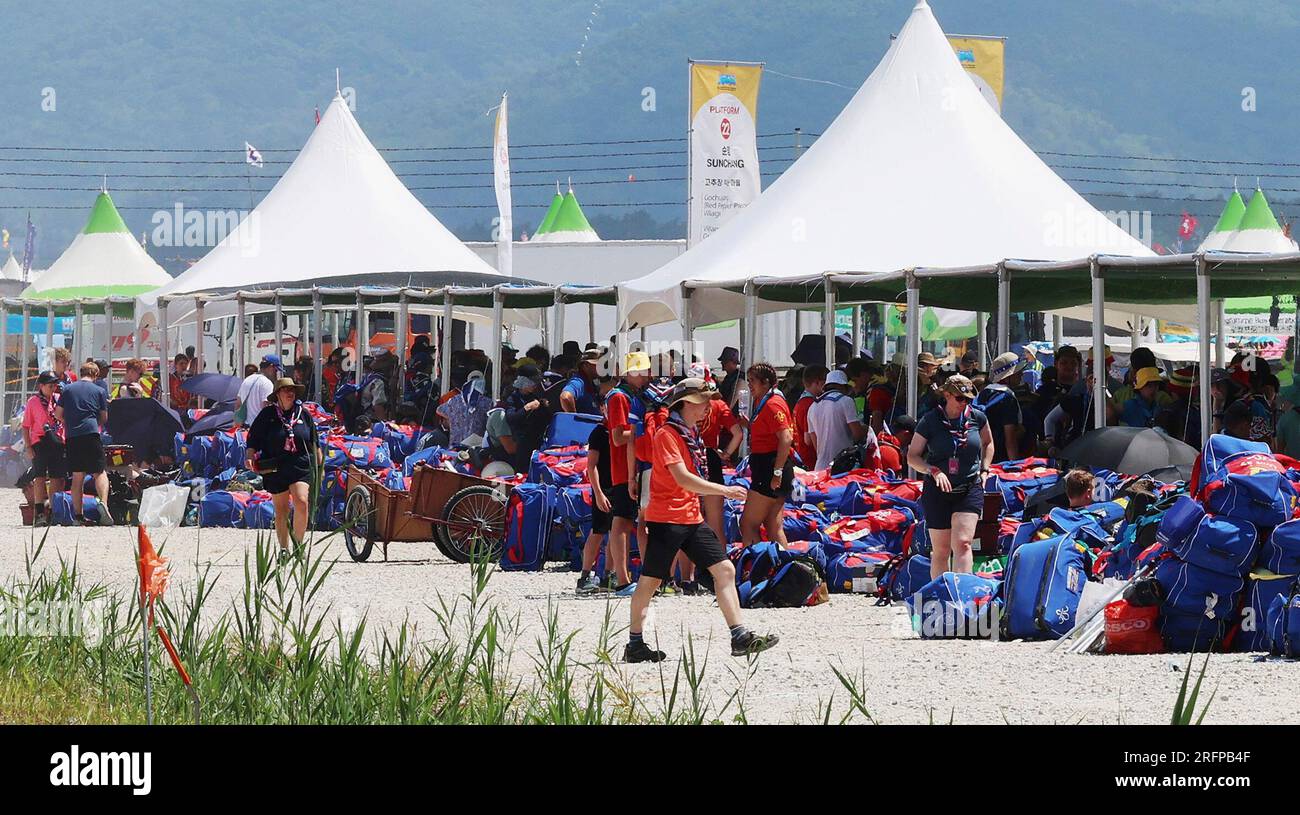 British scout members gather to leave the World Scout Jamboree campsite ...
