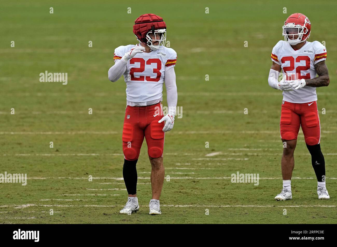Kansas City Chiefs linebacker Drue Tranquill (23) and cornerback Trent ...